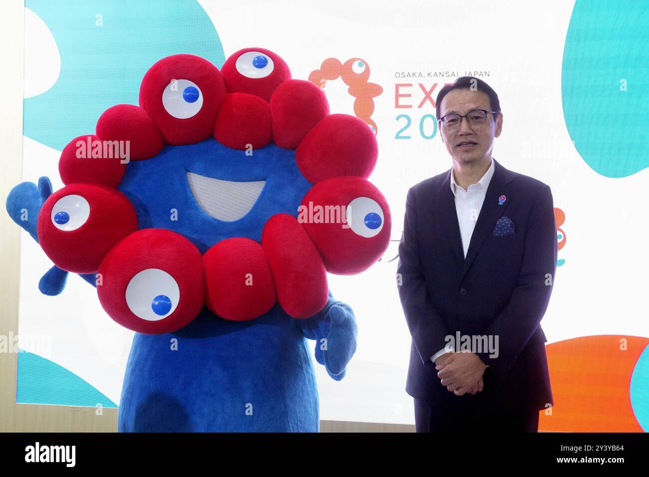 Japanese Ambassador to China Kenji Kanasugi poses with Myaku-Myaku, the ...