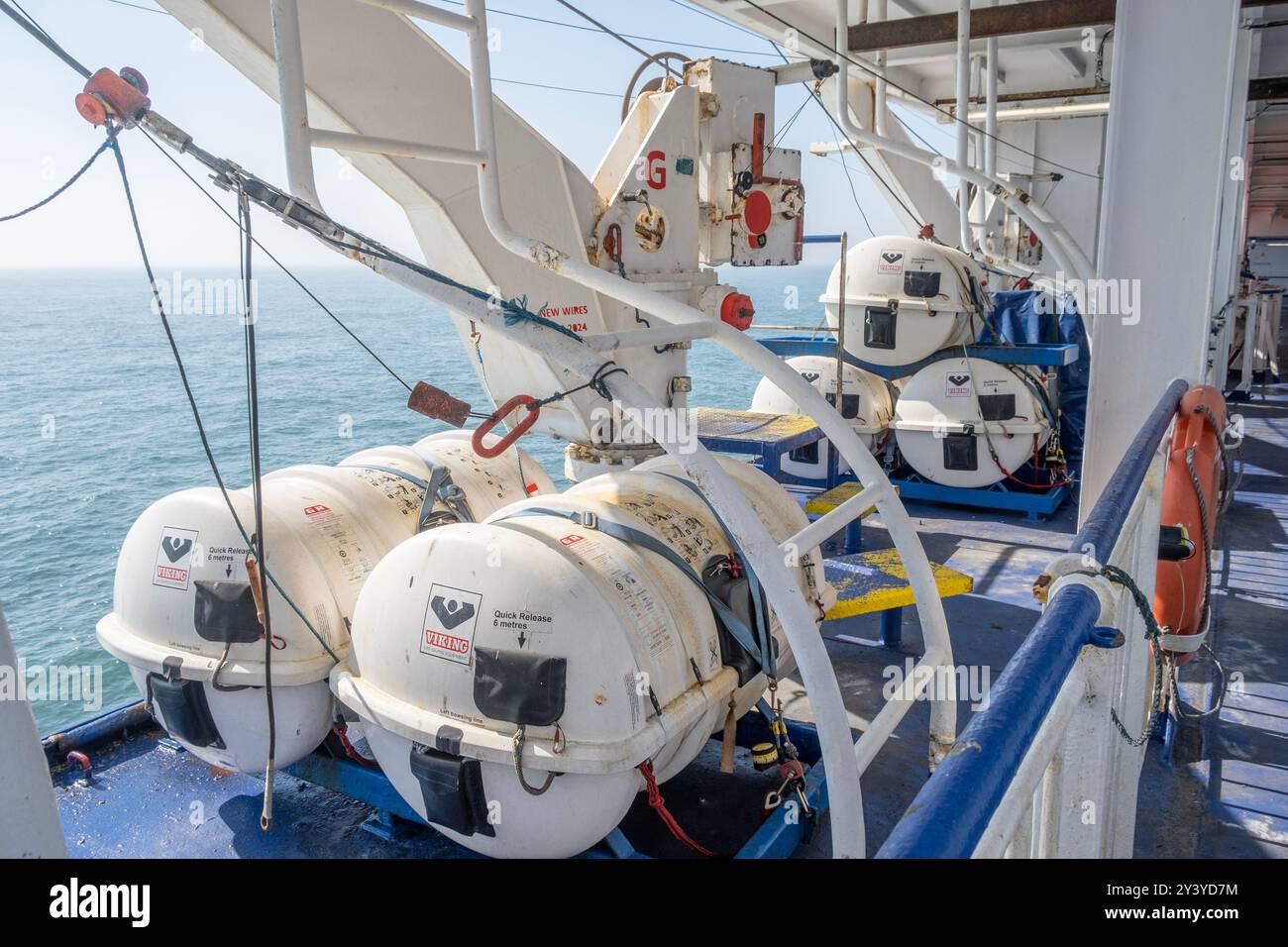Emergency life rafts for passenger evacuations, in their protective ...
