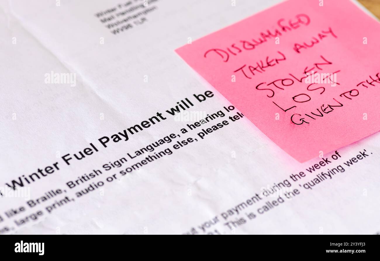 A Winter Fuel Payment cut concept with a letter and words written on a ...