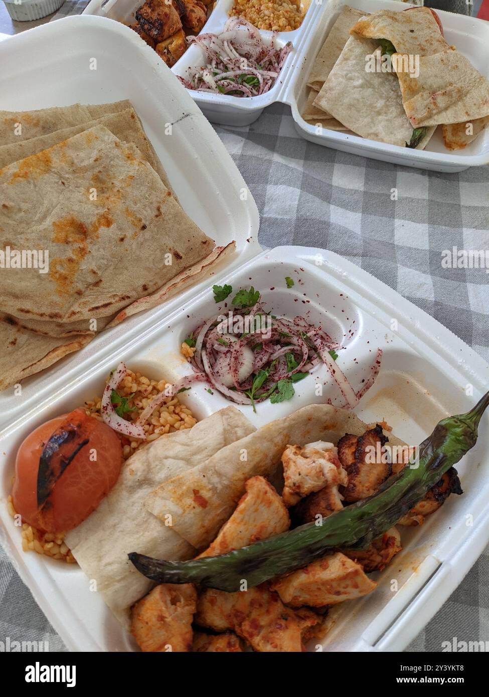 Turkish kebab in a container from the delivery service Stock Photo - Alamy