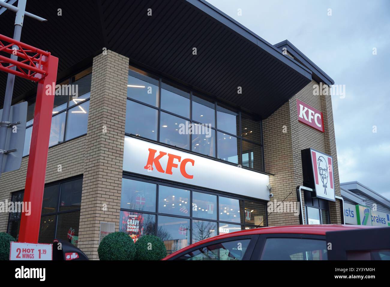 KFC fast food restaurant with store sign and logo. Kentucky Fried ...