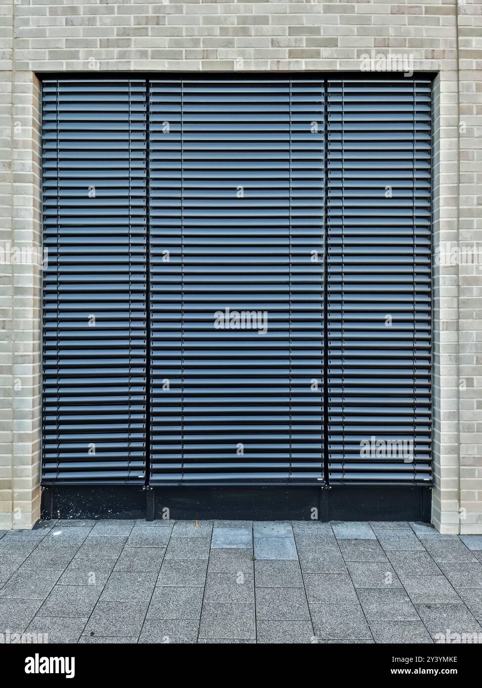 The exit is blocked by a gate that looks like a Venetian blind Stock ...