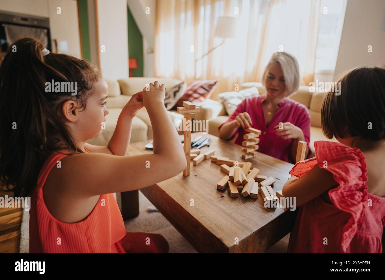 Family bonding wooden block hi-res stock photography and images - Alamy