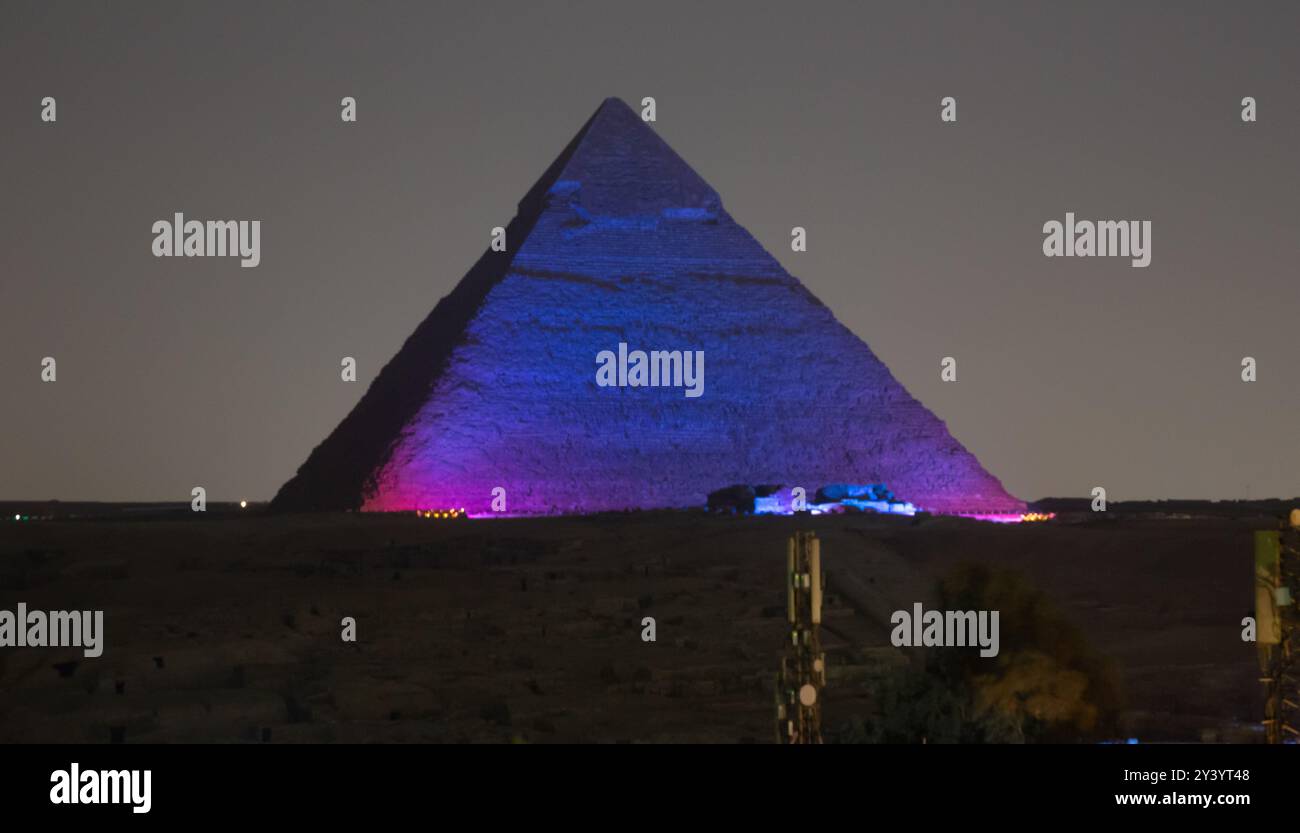 The Great Pyramid complex enlighted at night, Giza, Egypt Stock Photo ...
