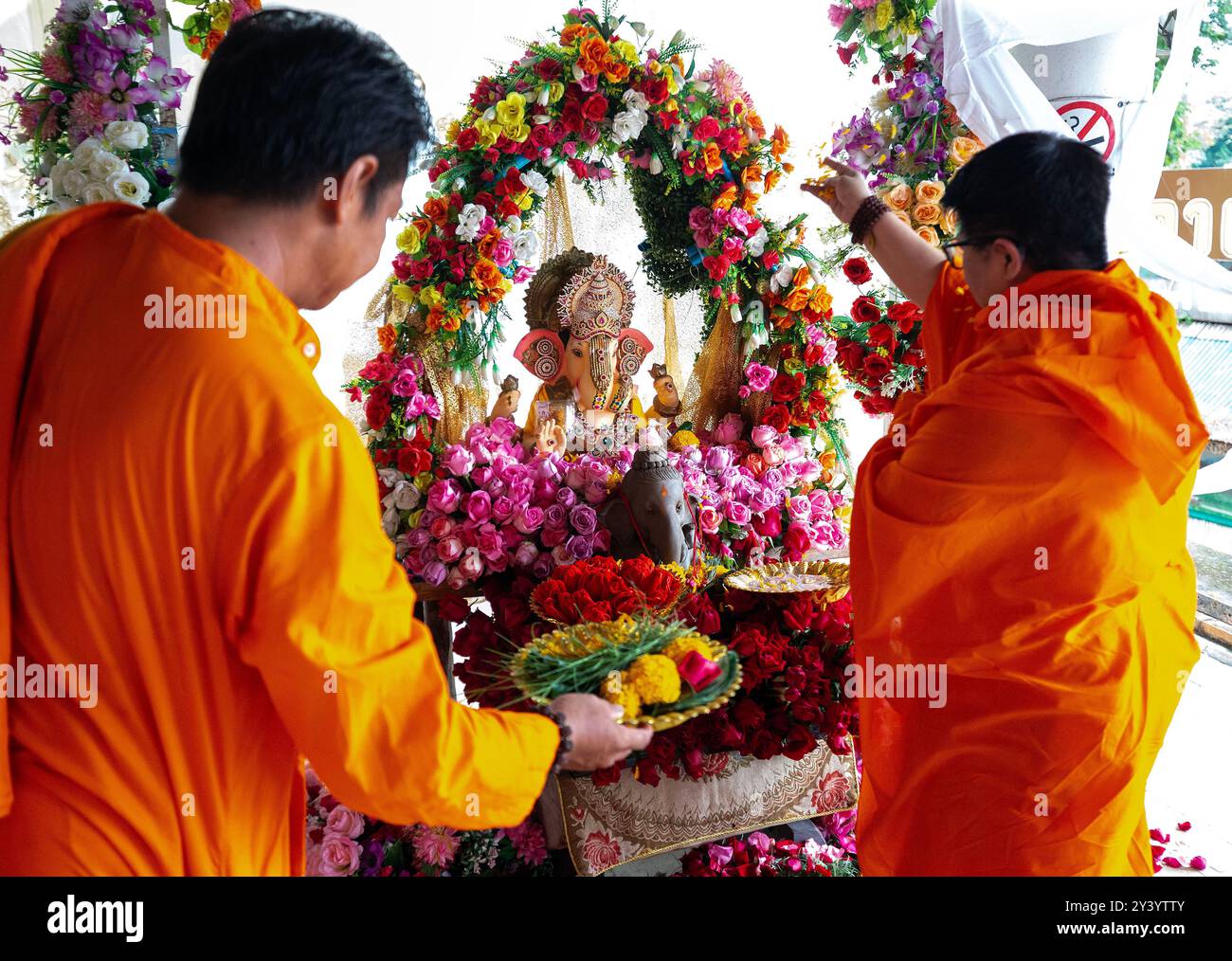 Hindu priests from Gurudeva Ashram are performing the ritual of ...