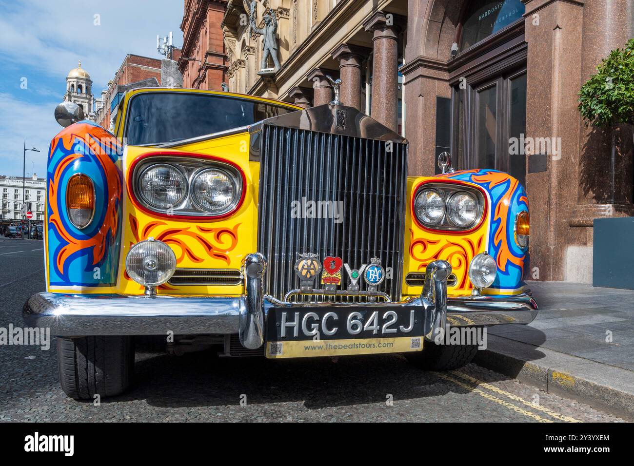 Beatles Rolls Royce Yellow phsychodelic car Stock Photo - Alamy