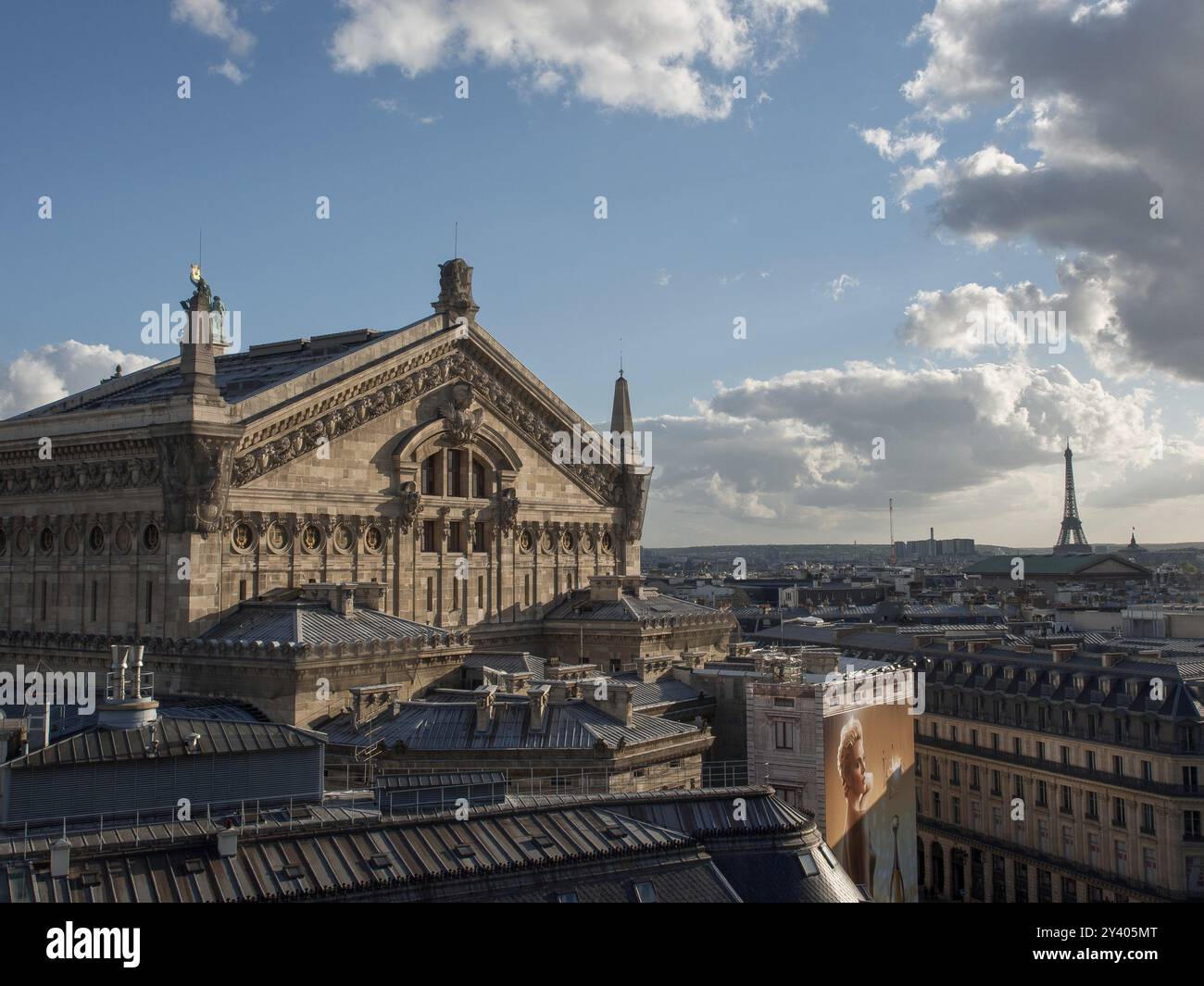 An impressive historic building towers over the Paris skyline with the ...