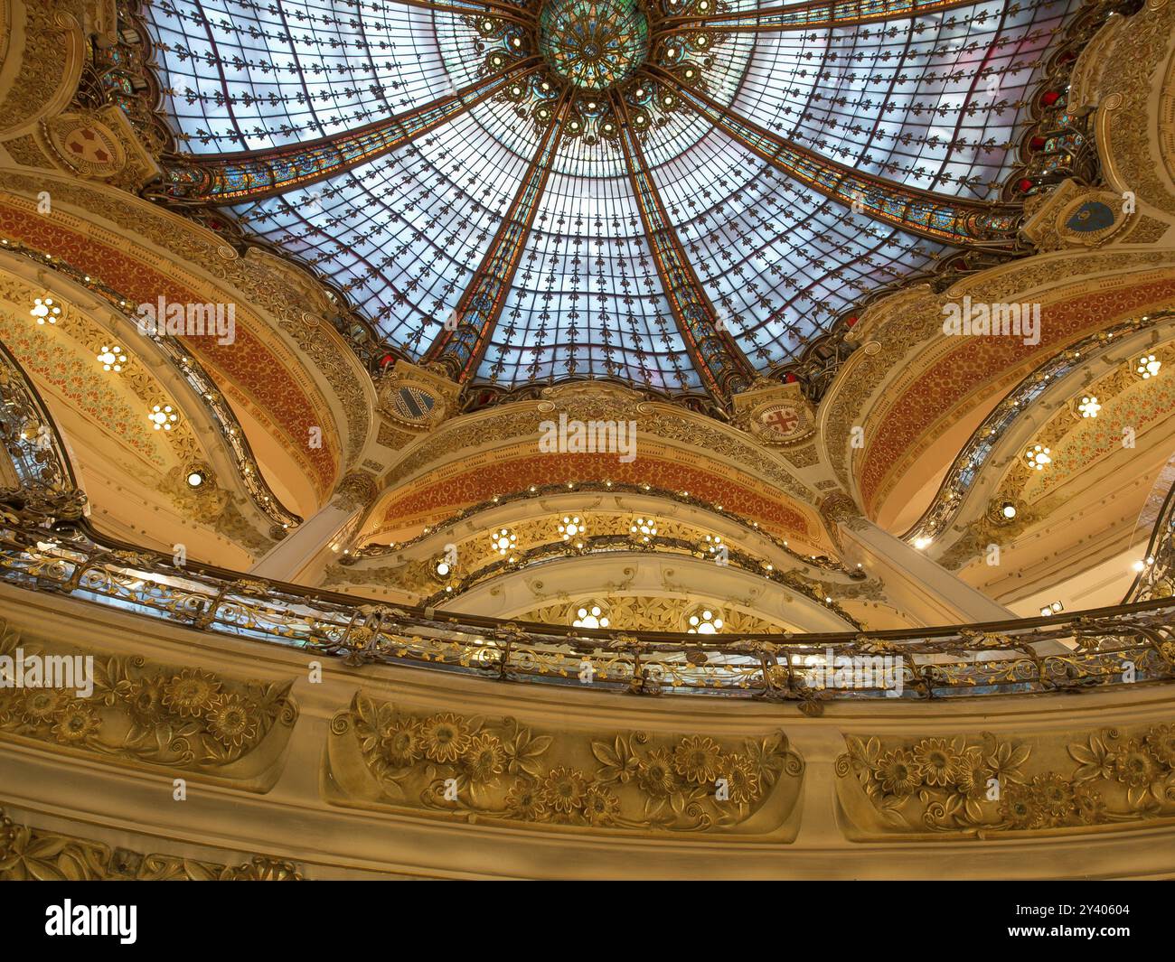 Magnificently decorated dome with colourful stained glass windows that ...