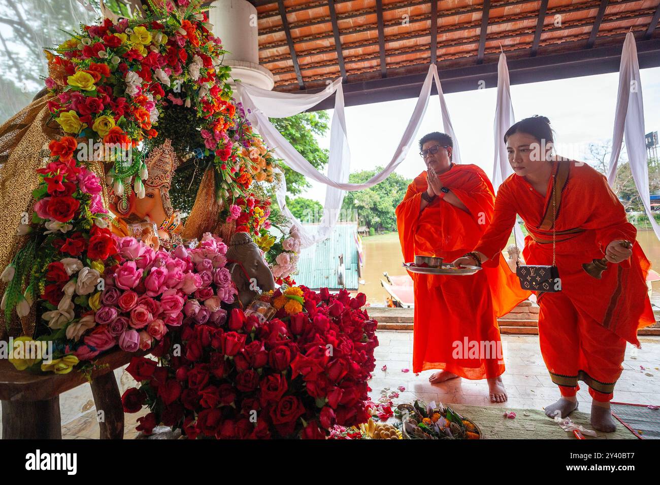 Hindu priests from Gurudeva Ashram are performing the ritual of ...