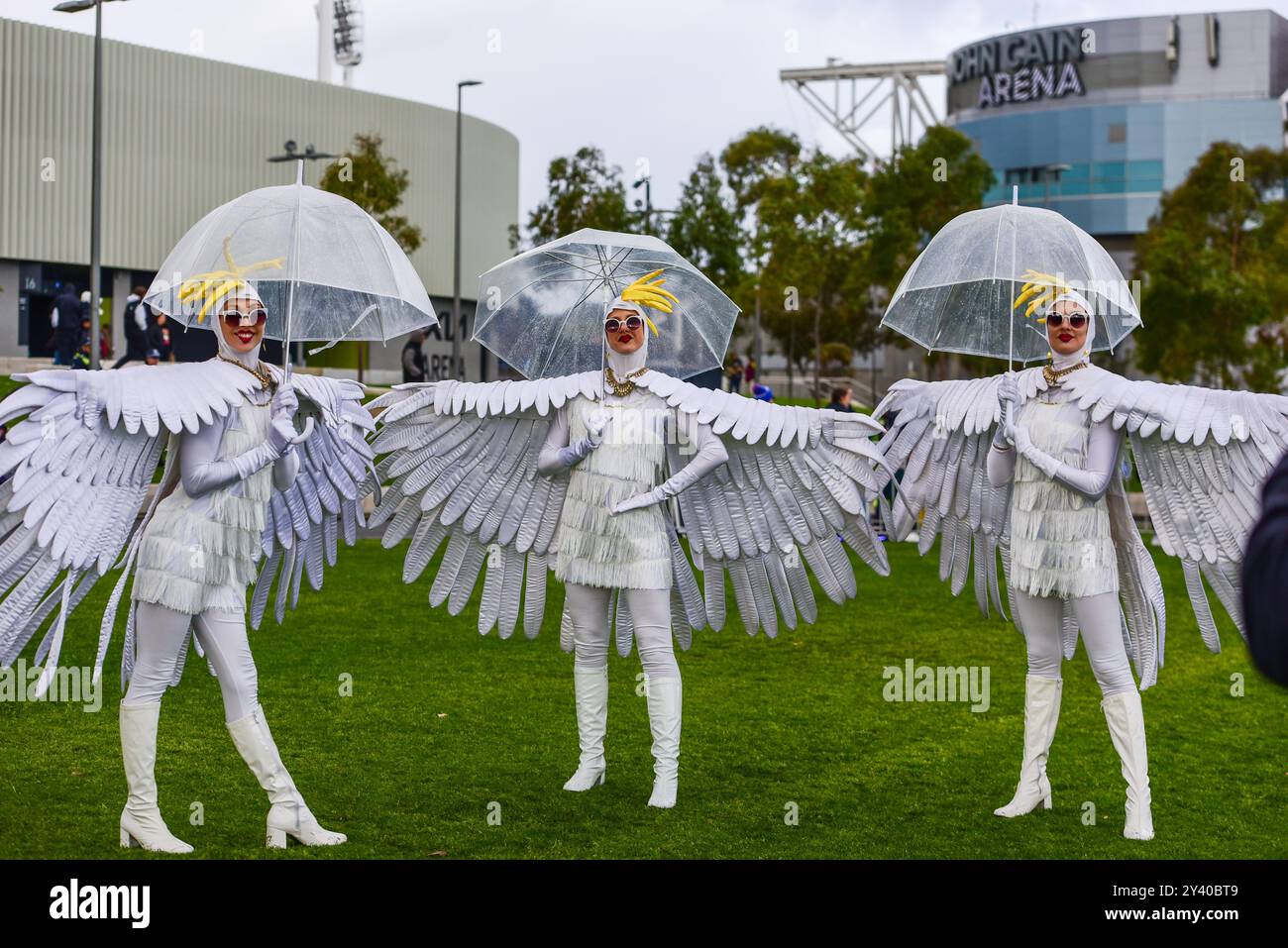 Entertainers wearing "glam" chicken costumes are seen at the Olympic ...