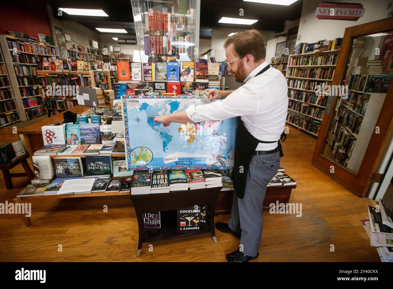 Michael Bumsted who owns the independent bookstore Whodunit Mystery ...