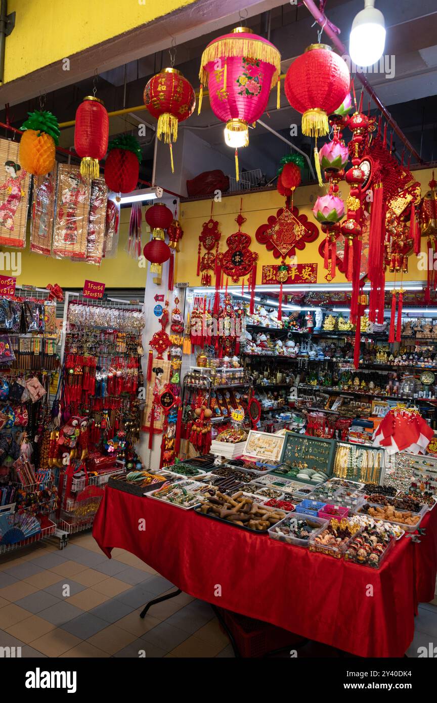 A small Chinese hawker stall in the Chinatown Complex filled with ...