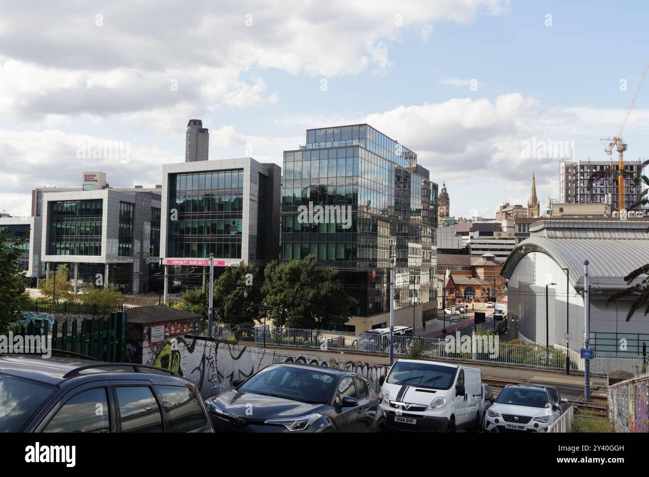 Skyline of Sheffield city centre, England UK, and graffiti on bridge ...