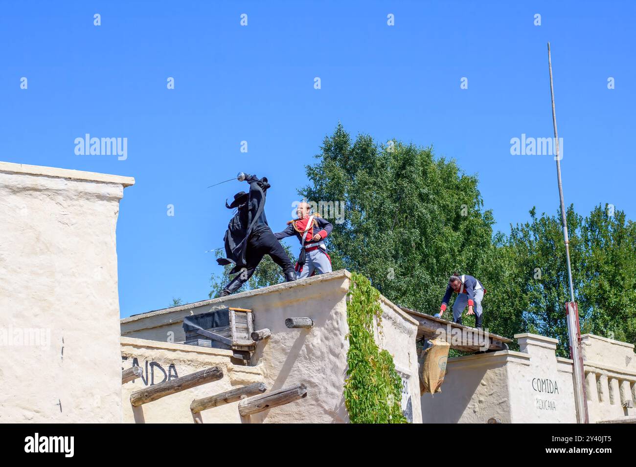 Zorro fencing on roof Stock Photo - Alamy
