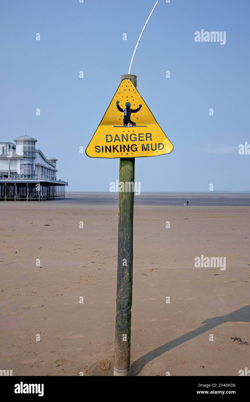 Danger Sinking Mud sign on the beach at Weston-Super- Mare, Somerset ...