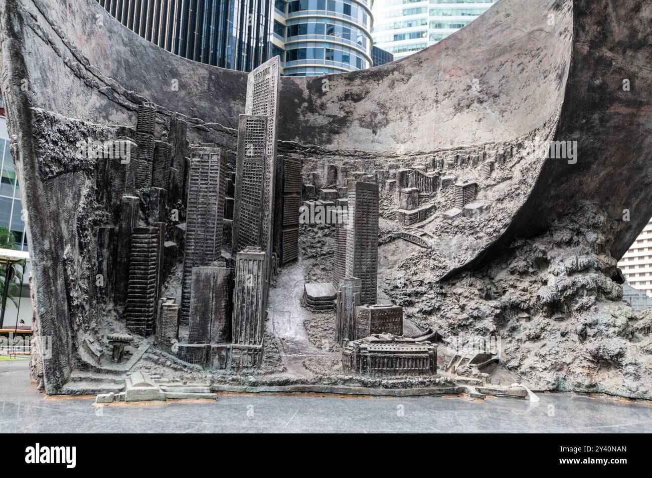 A Progress and Advancement sculpture of Raffles Place carved with a mix ...