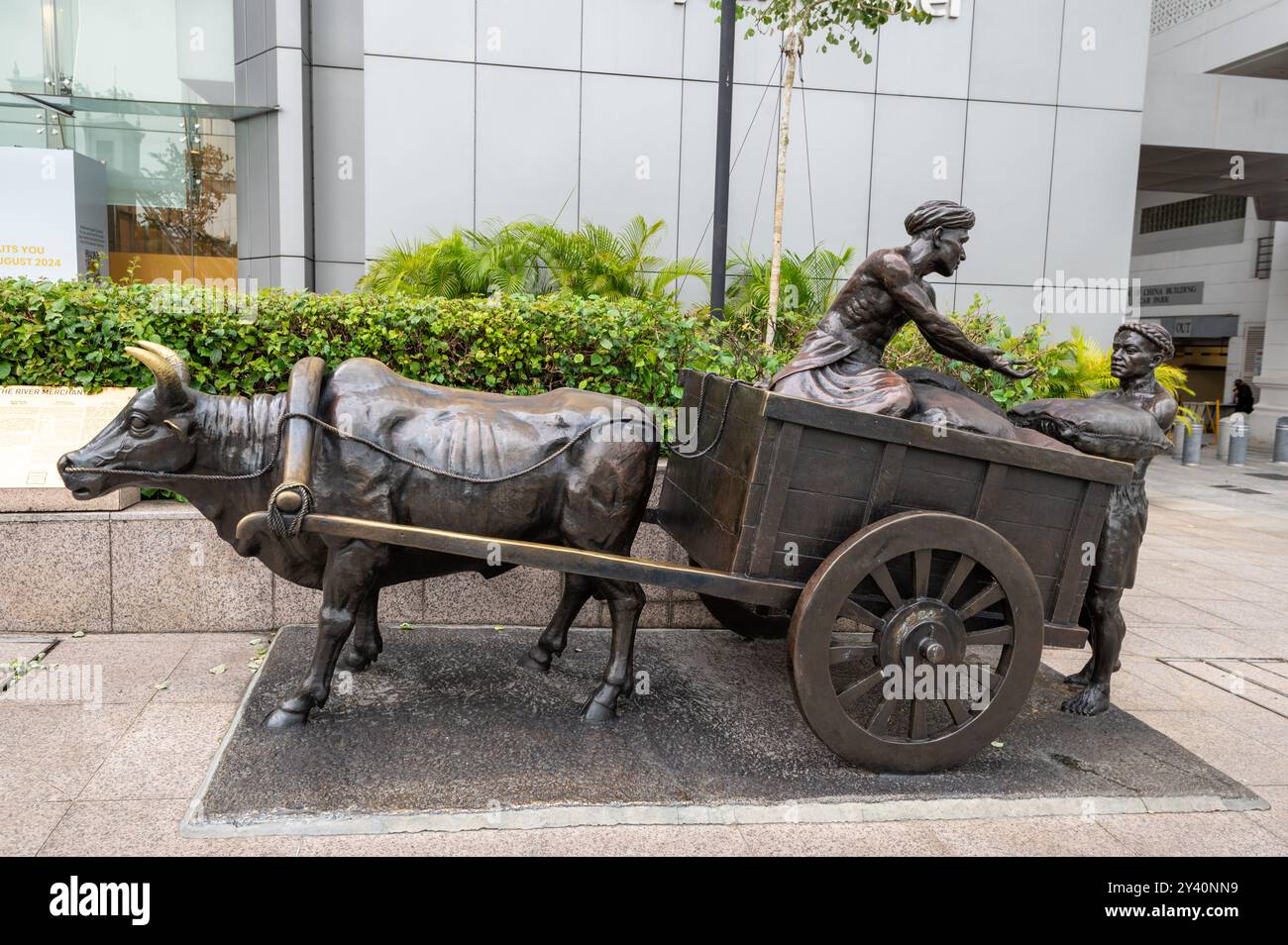 At the 32-storey Maybank Tower are some statues called ‘River Merchants ...