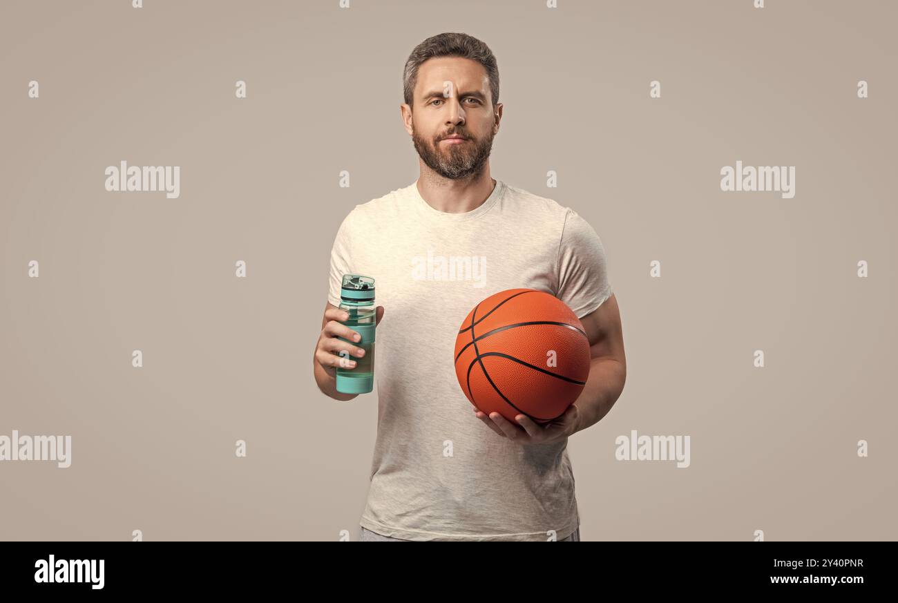 sport man basketball player drinking water. photo of sport man ...