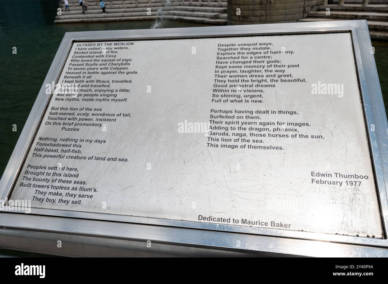 A large tablet of a poem – ‘Ulysses by the Merlion’ near the Merlion of ...