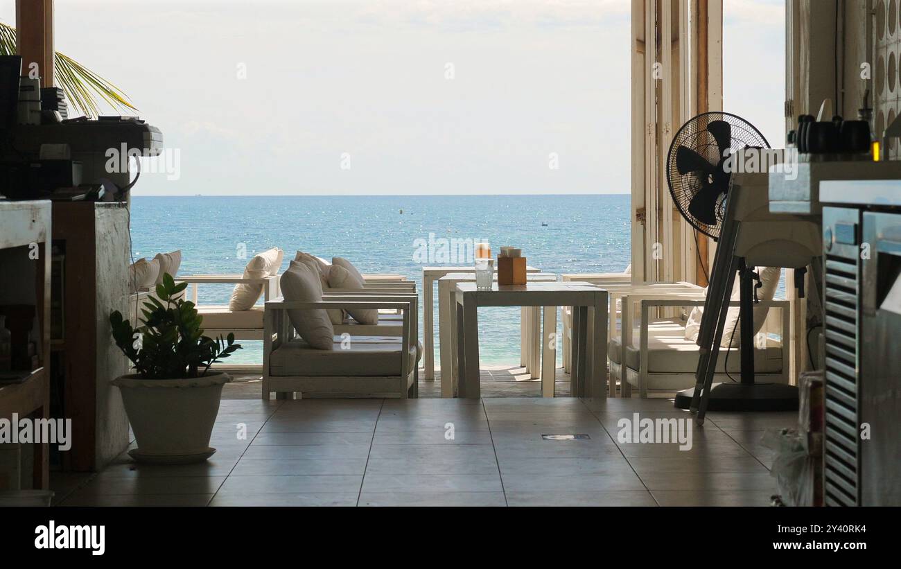 Cozy beachfront cafe with scenic ocean view, inviting atmosphere and ...