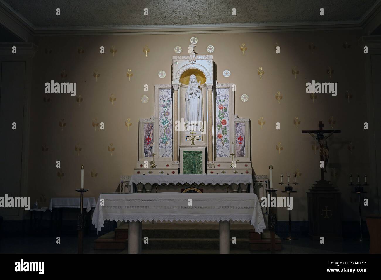 The sanctuary of the Chapel of St. Therese, on the lower level of the ...