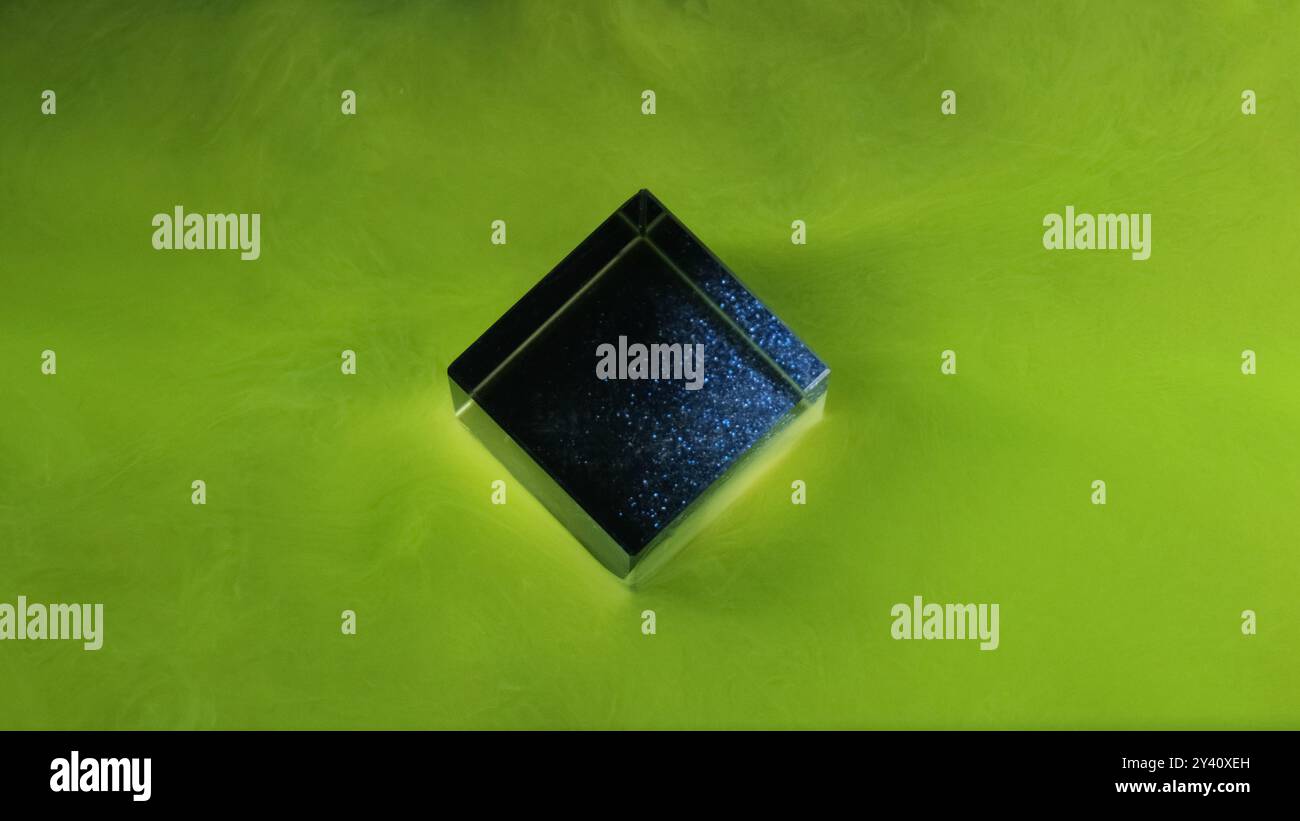 Fantasy smoke. Color water. Green acid ink covering glowing black ...