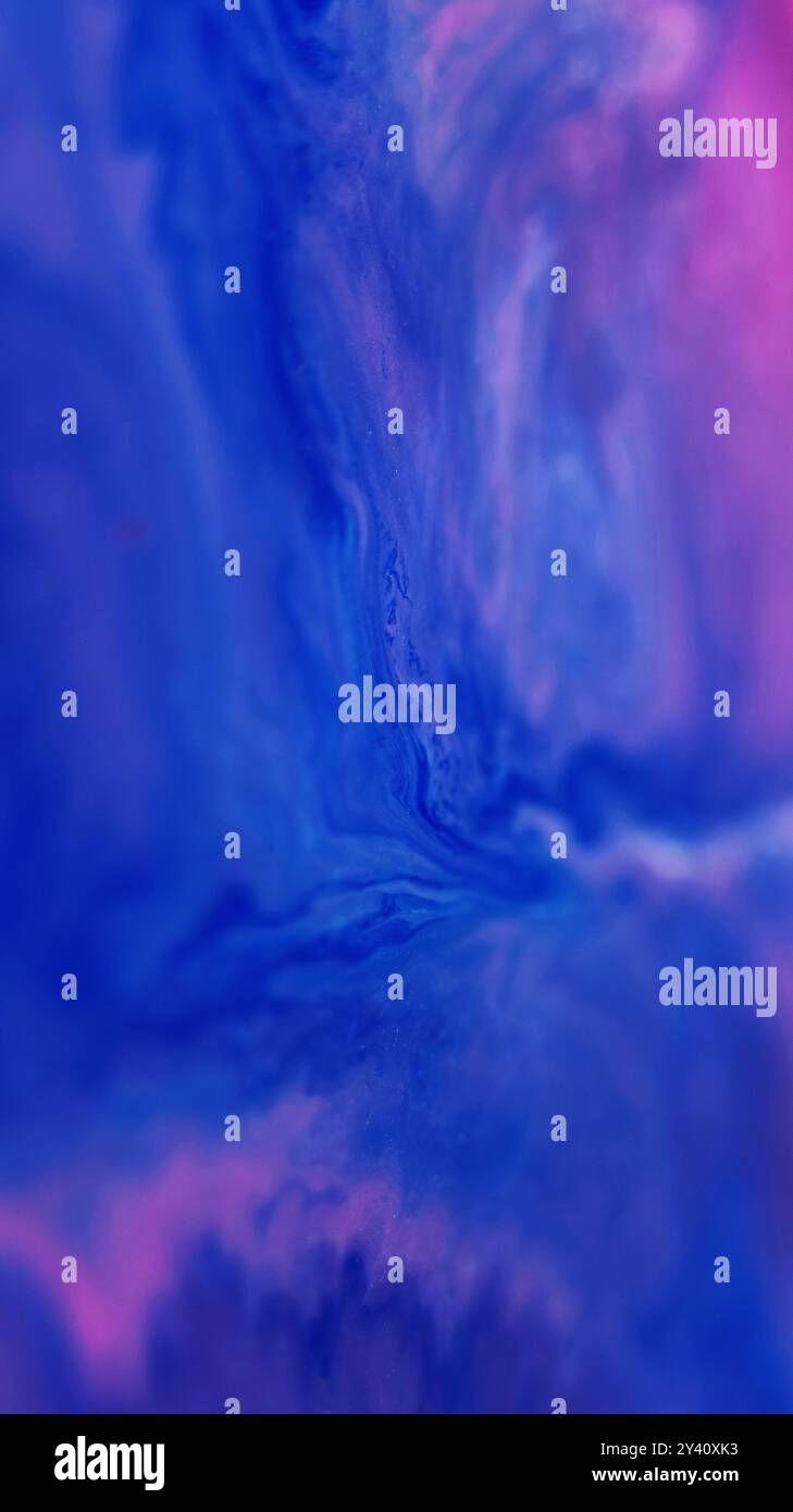 Paint mix. Defocused background. Blur pink blue color fluid blend wave ...