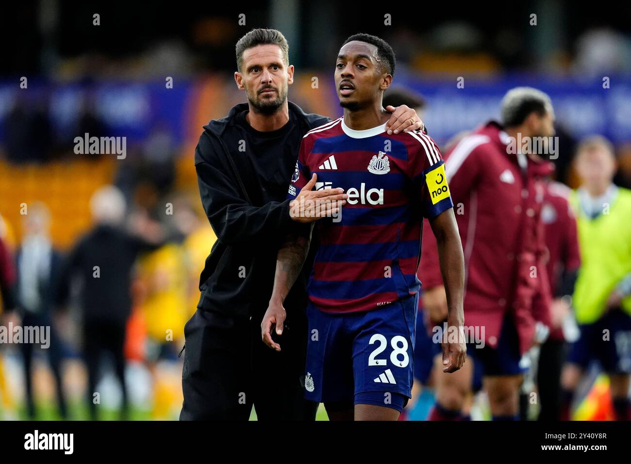 Newcastle United's Joe Willock (right) with assistant manager Jason ...