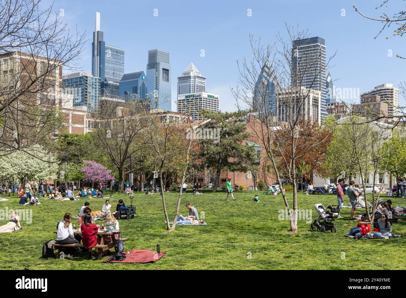 Crowds in Schuylkill River Park (Fitler Square) and skyline in late ...