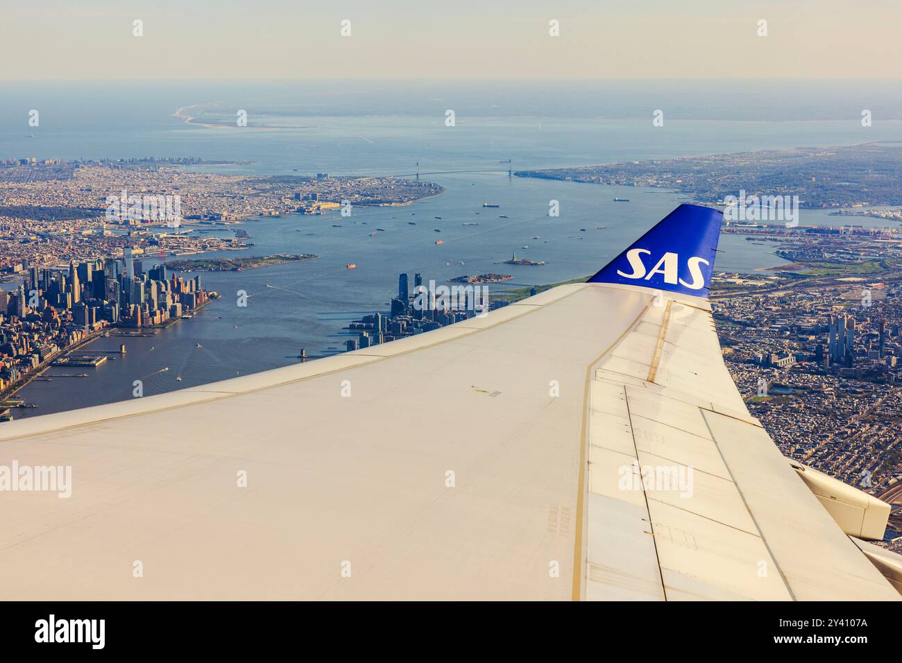 View from airplane window of Manhattan and Hudson River with SAS ...