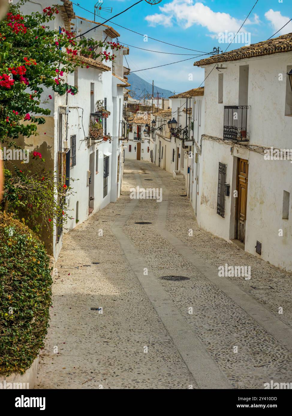 Quaint old narrow street in Altea town, Spain Stock Photo - Alamy