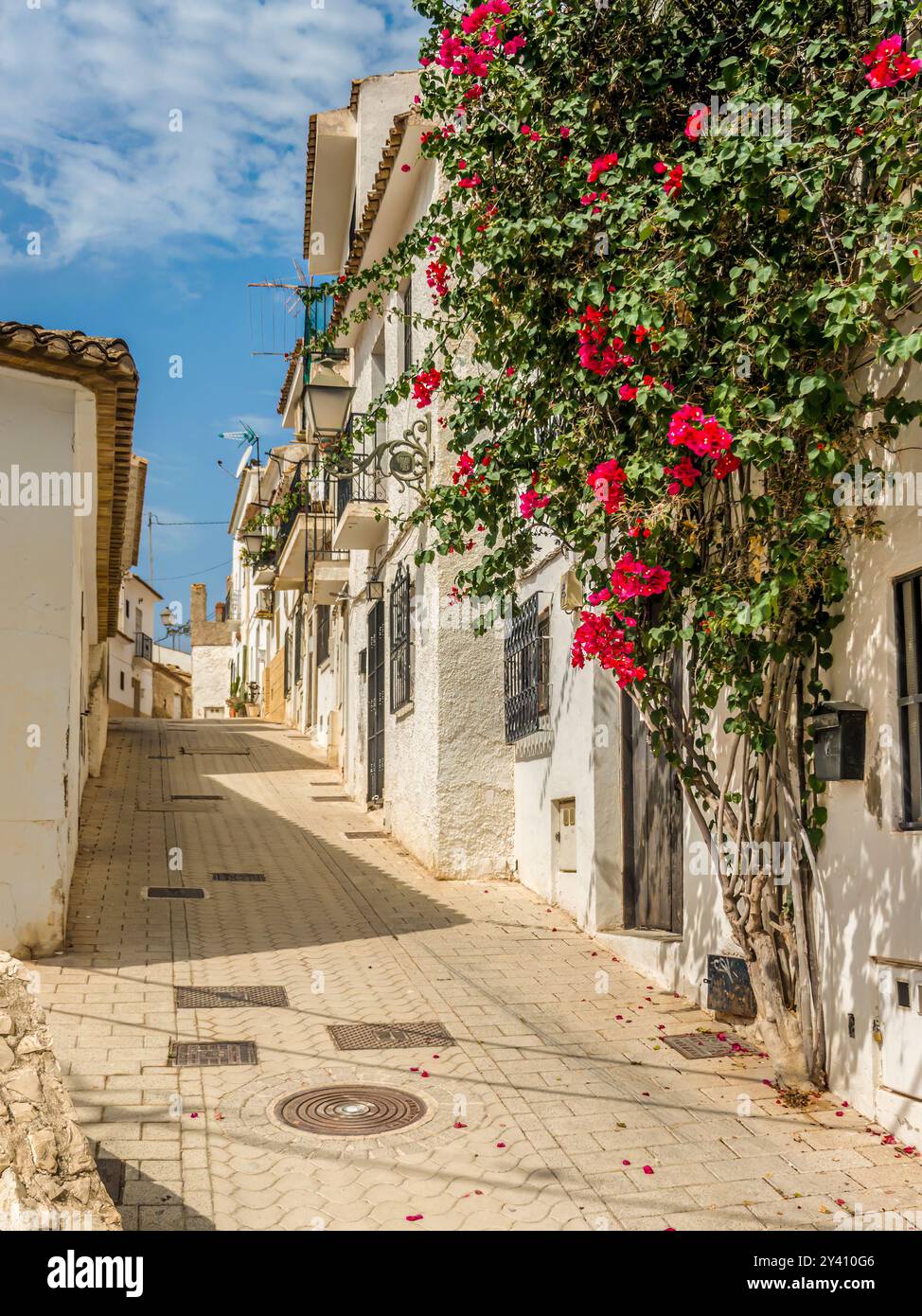Quaint old narrow street in Altea town, Spain Stock Photo - Alamy