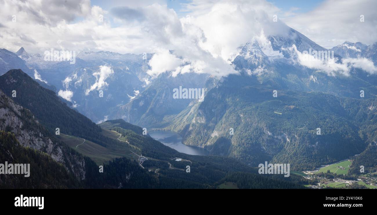 Day alpine landscape scenery with green valley, lake and snowy mountain ...