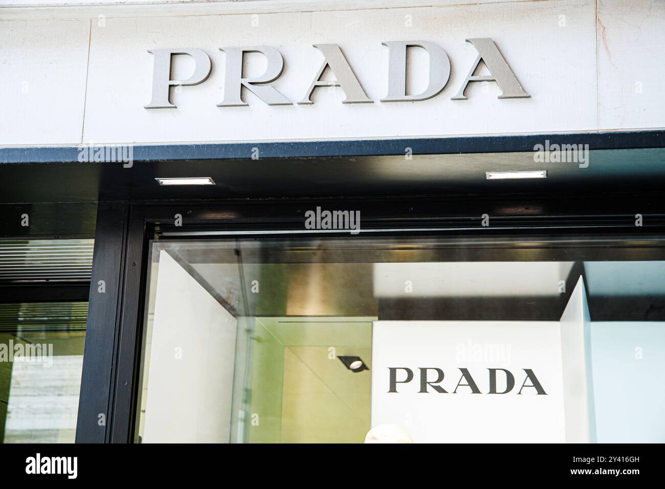 Venecia, Italia, 17 of August 2024: A sophisticated storefront features elegant Prada branding ...