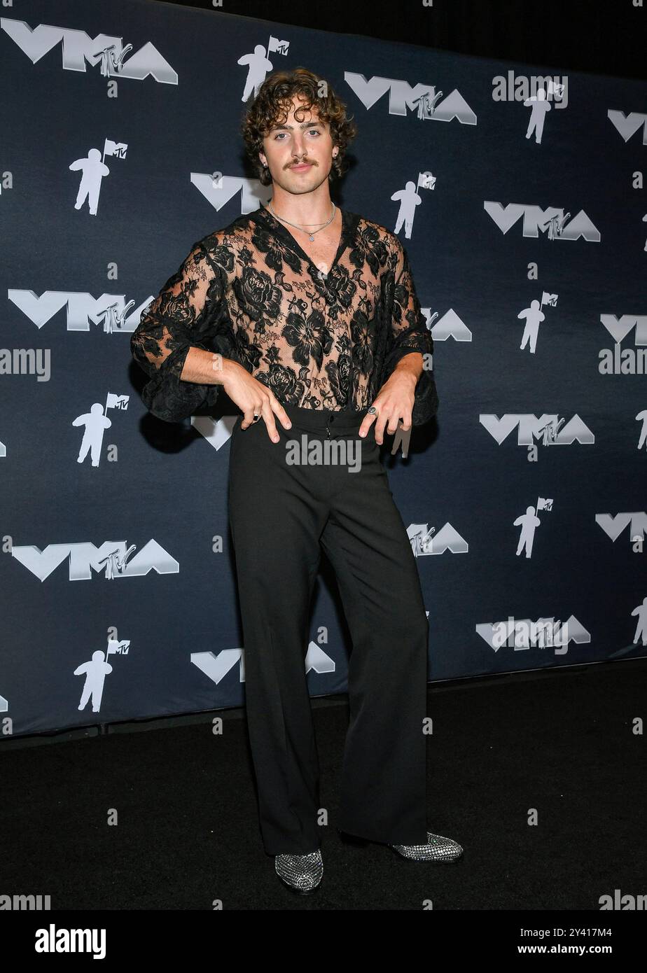Benson Boone poses in the press room during the MTV Video Music Awards ...