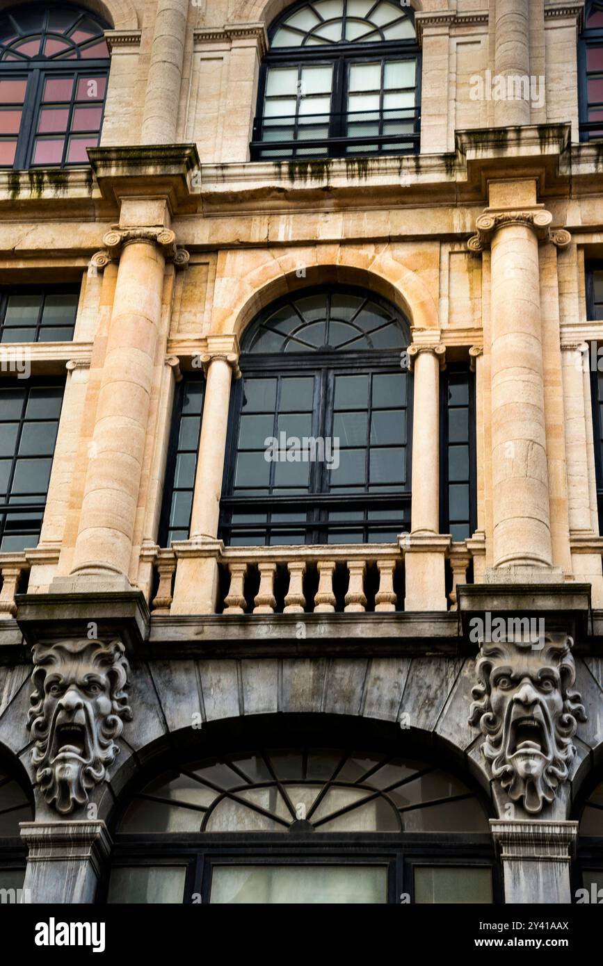 Large grotesques in Bruges, Belgium Stock Photo - Alamy