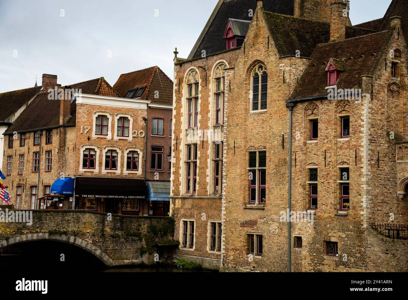 Neo-Gothic traced brick window pediments in Bruges, Belgium Stock Photo ...