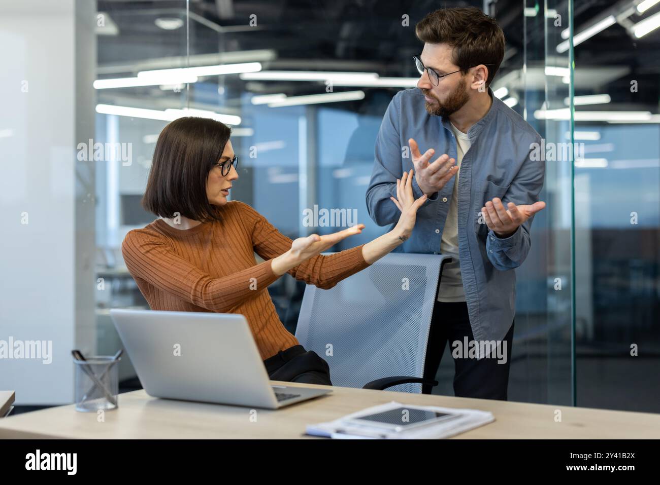Office conflict between man hi-res stock photography and images - Alamy