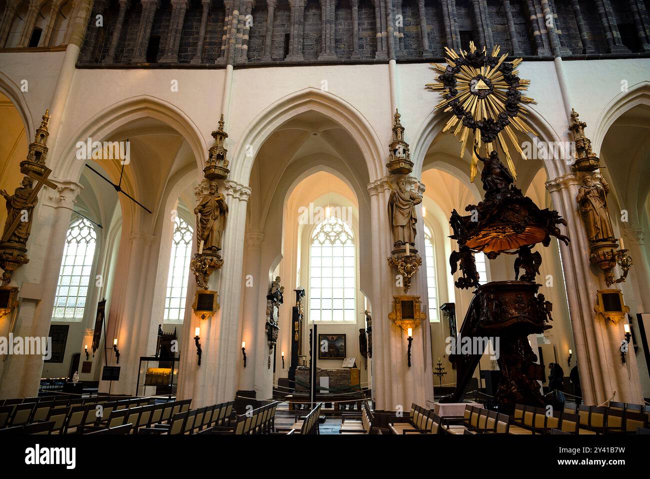 Baroque style interior nave and carved Rococo wood pulpit of Our Lady ...