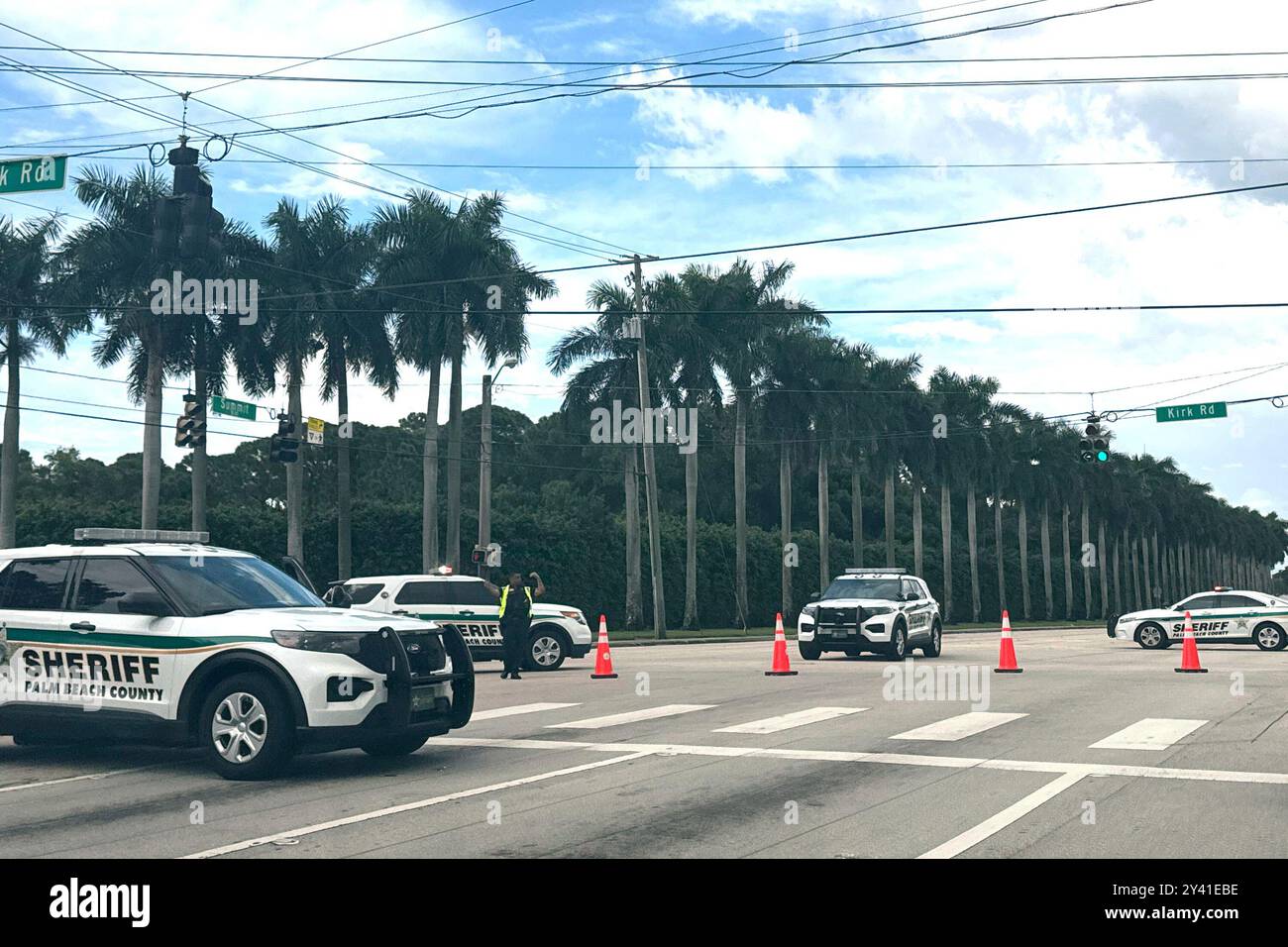 Sheriff vehicles are pictured near Trump International Golf Club ...