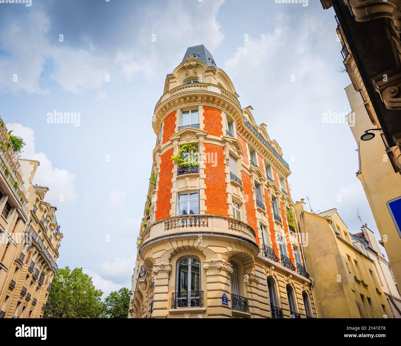 Elegant Parisian building facade with balconies and attics. Typical ...