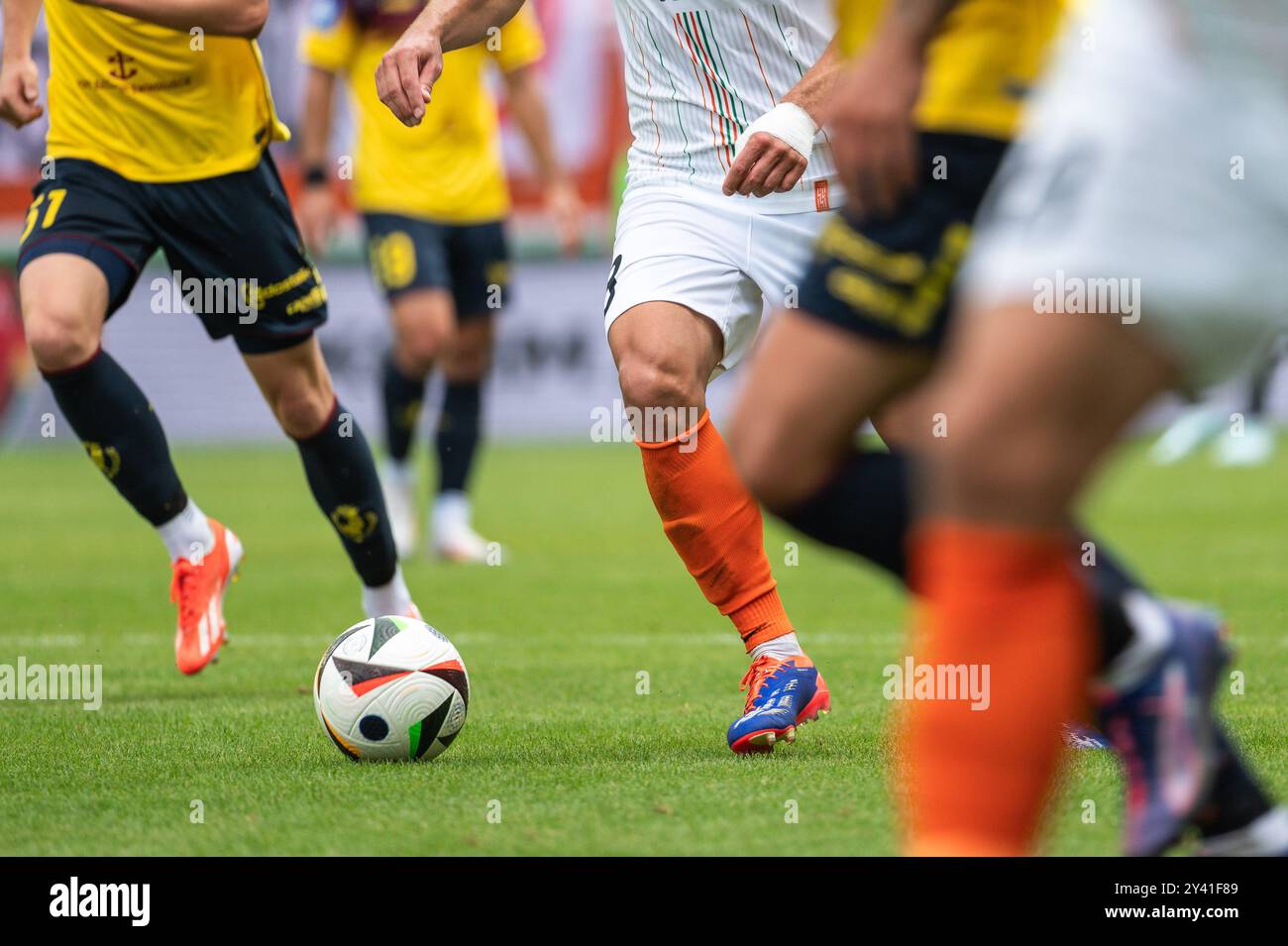 Player dribbling ball between legs hi-res stock photography and images ...