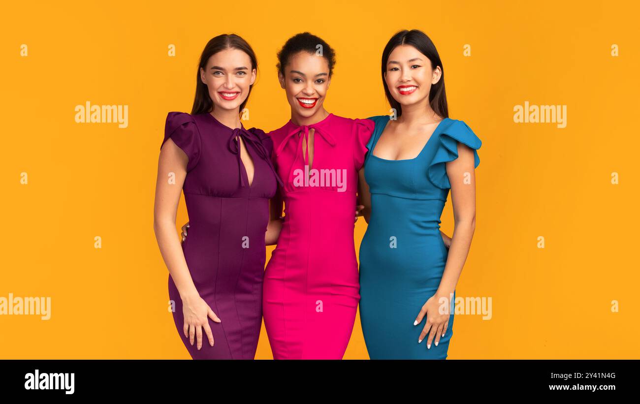 Three Diverse Ladies In Dresses Smiling And Hugging, Studio Shot Stock ...