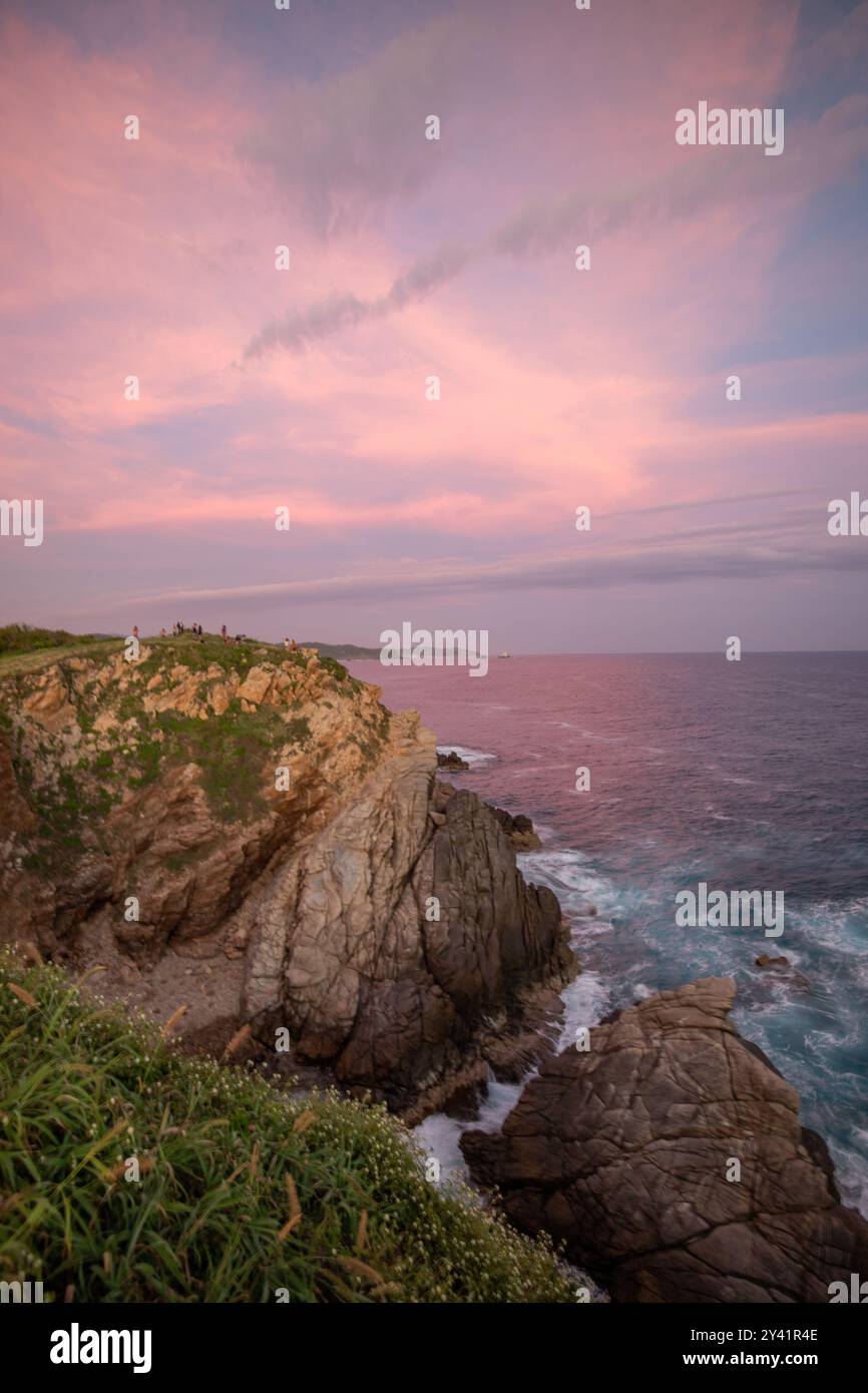 Punta Cometa viewpoint in a beautiful pink sunset in Oaxaca, Mexico ...