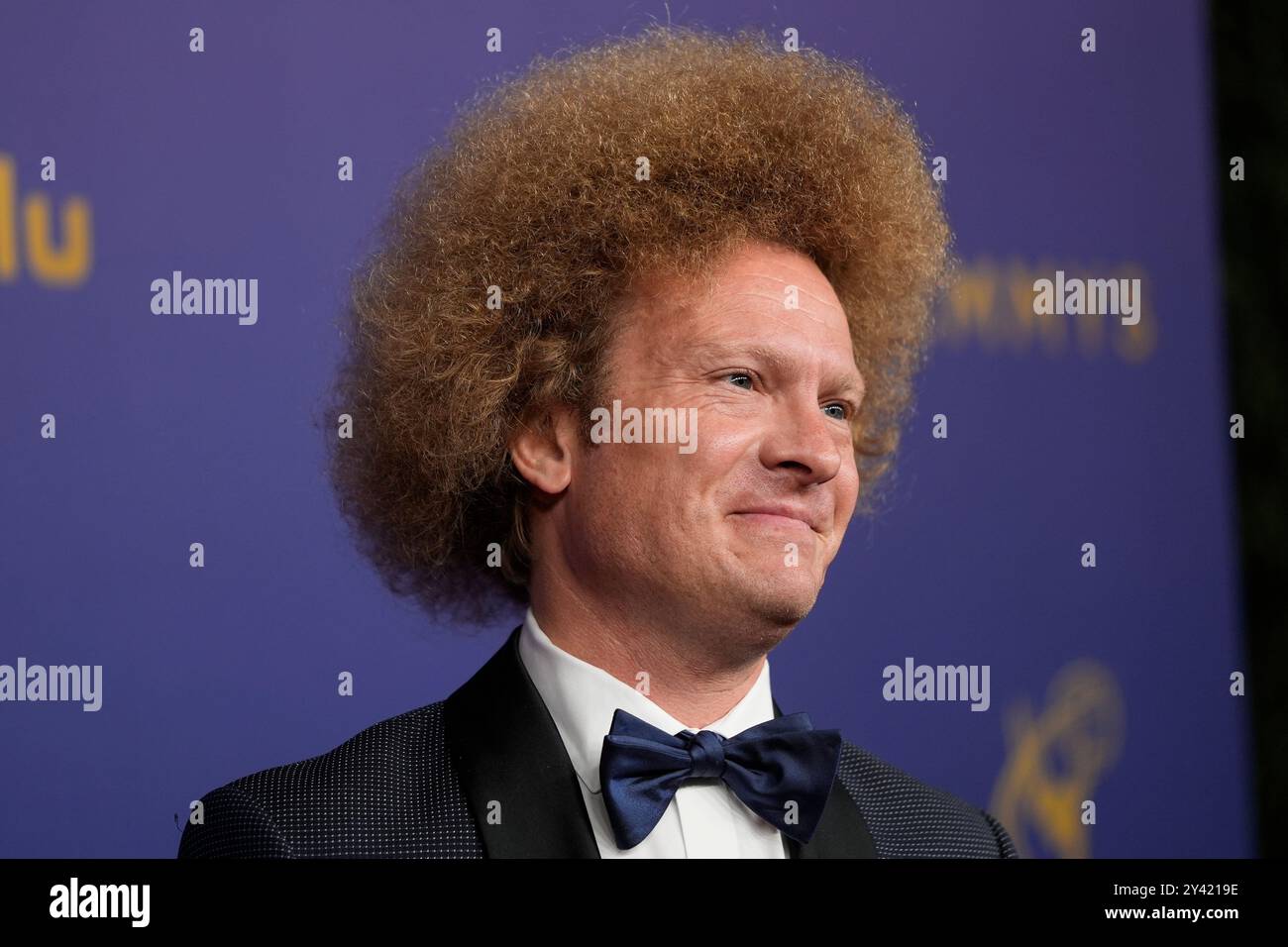 Adam Feil arrives at the 76th Primetime Emmy Awards on Sunday, Sept. 15 ...