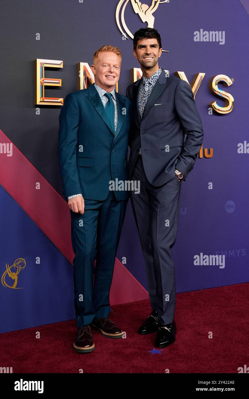 Jesse Tyler Ferguson, left, and Justin Mikita arrive at the 76th ...