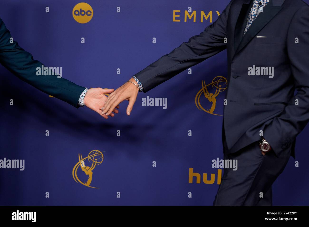 Jesse Tyler Ferguson, left, and Justin Mikita arrive at the 76th ...