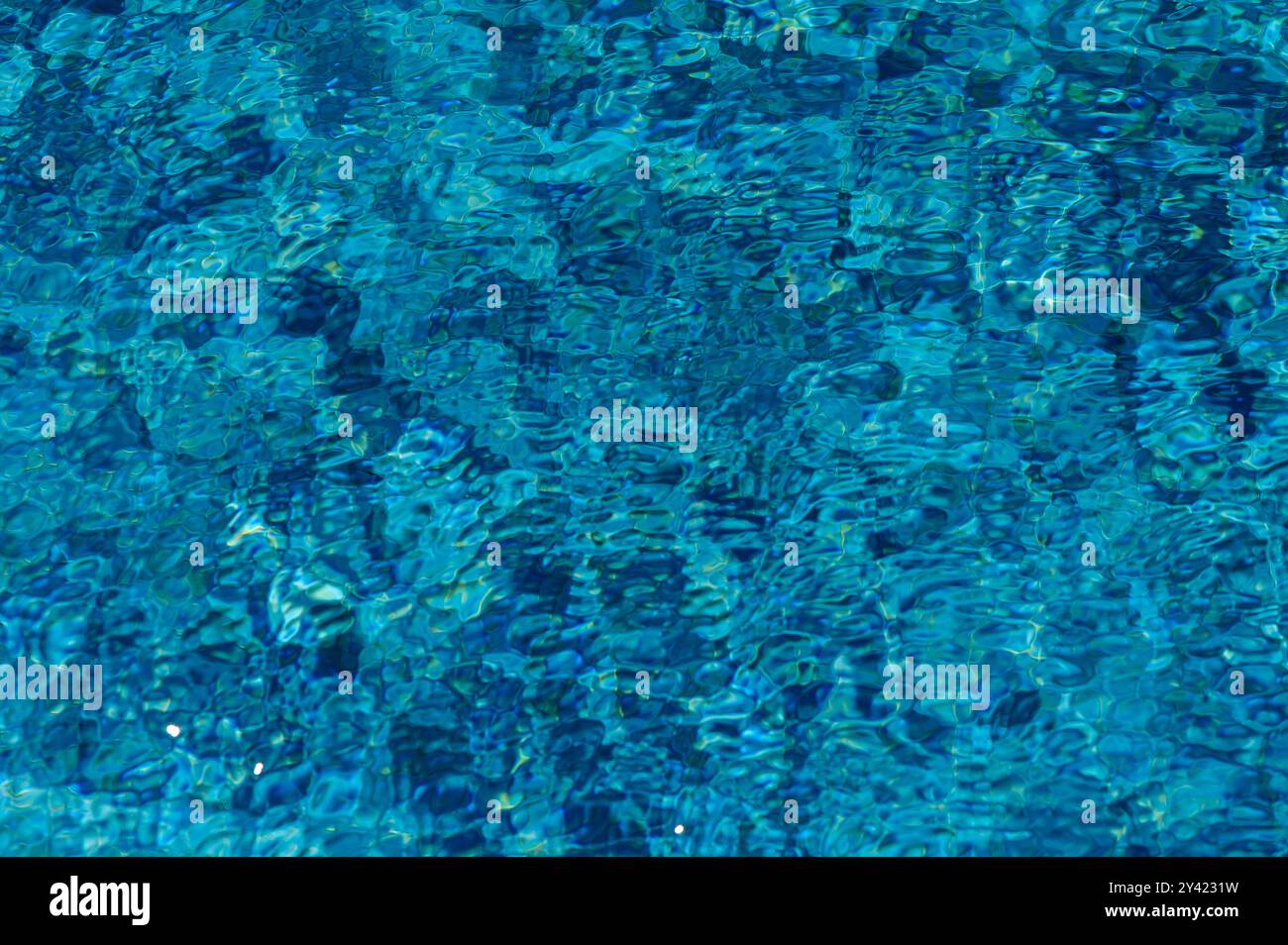 Beautiful sun reflections of water in the pool. Summer. Flight holidays ...