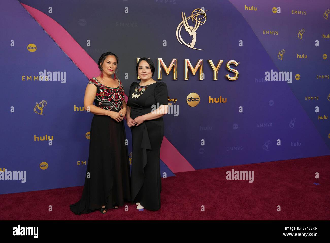 Princess Daazhraii Johnson and Cathy Tagnak Rexford pose for a Red ...