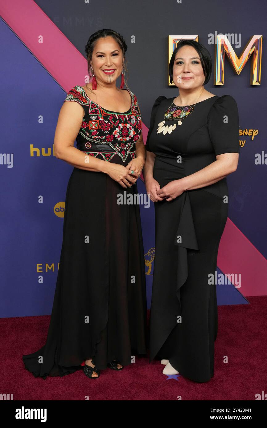 Princess Daazhraii Johnson and Cathy Tagnak Rexford pose for a Red ...